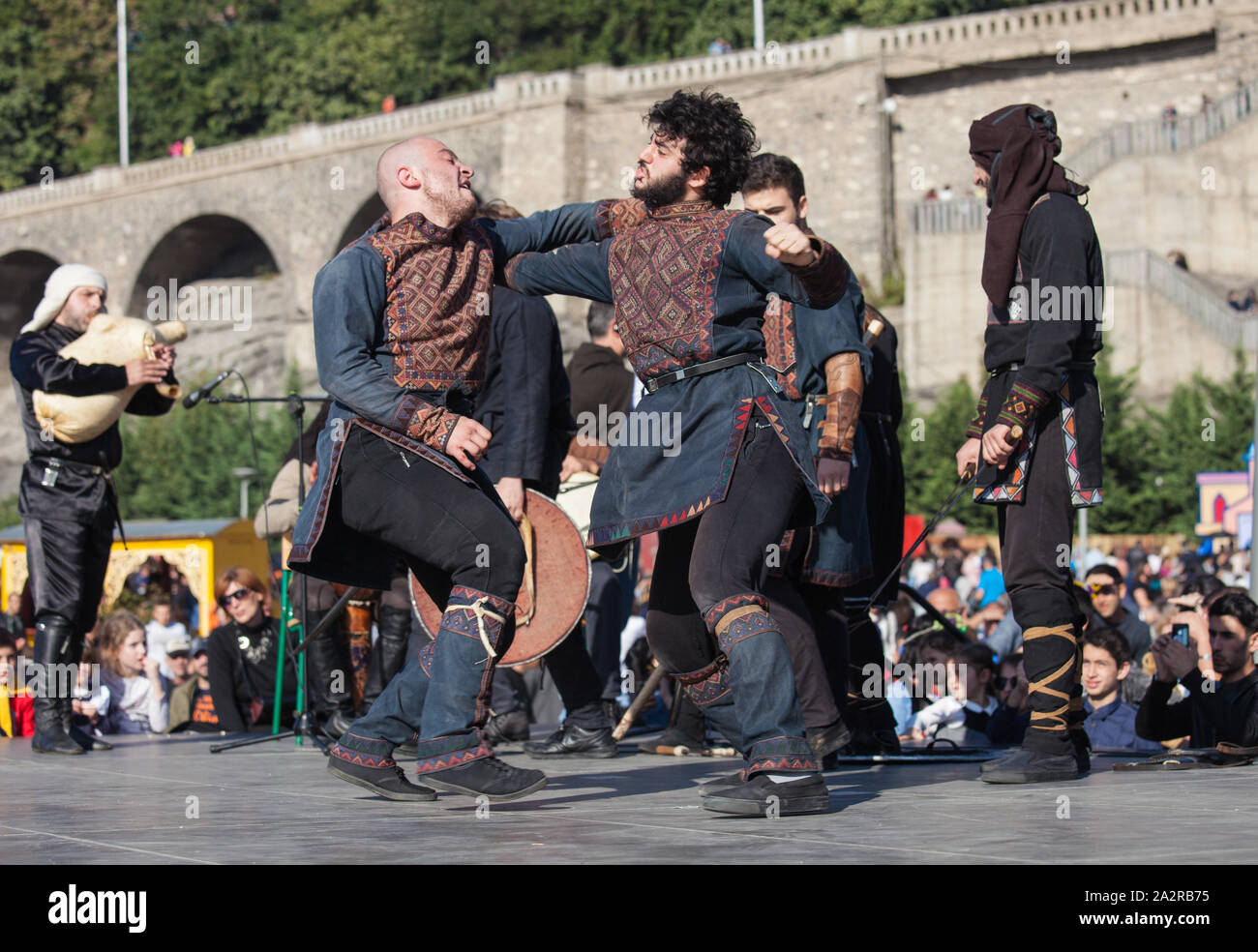 Georgian people in national costumes hi-res stock photography and ...