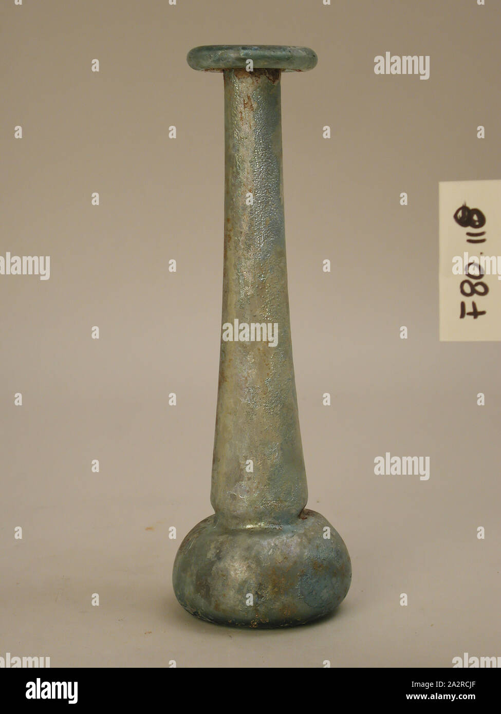 Roman, Unguentarium, 3rd/4th Century AD, Glass, H. 8 1/8 - 8 1/4 x D. 2 ...