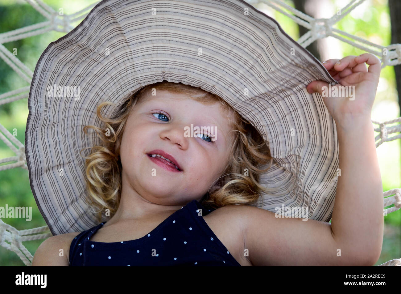 portrait of a blond girl in a net Stock Photo - Alamy