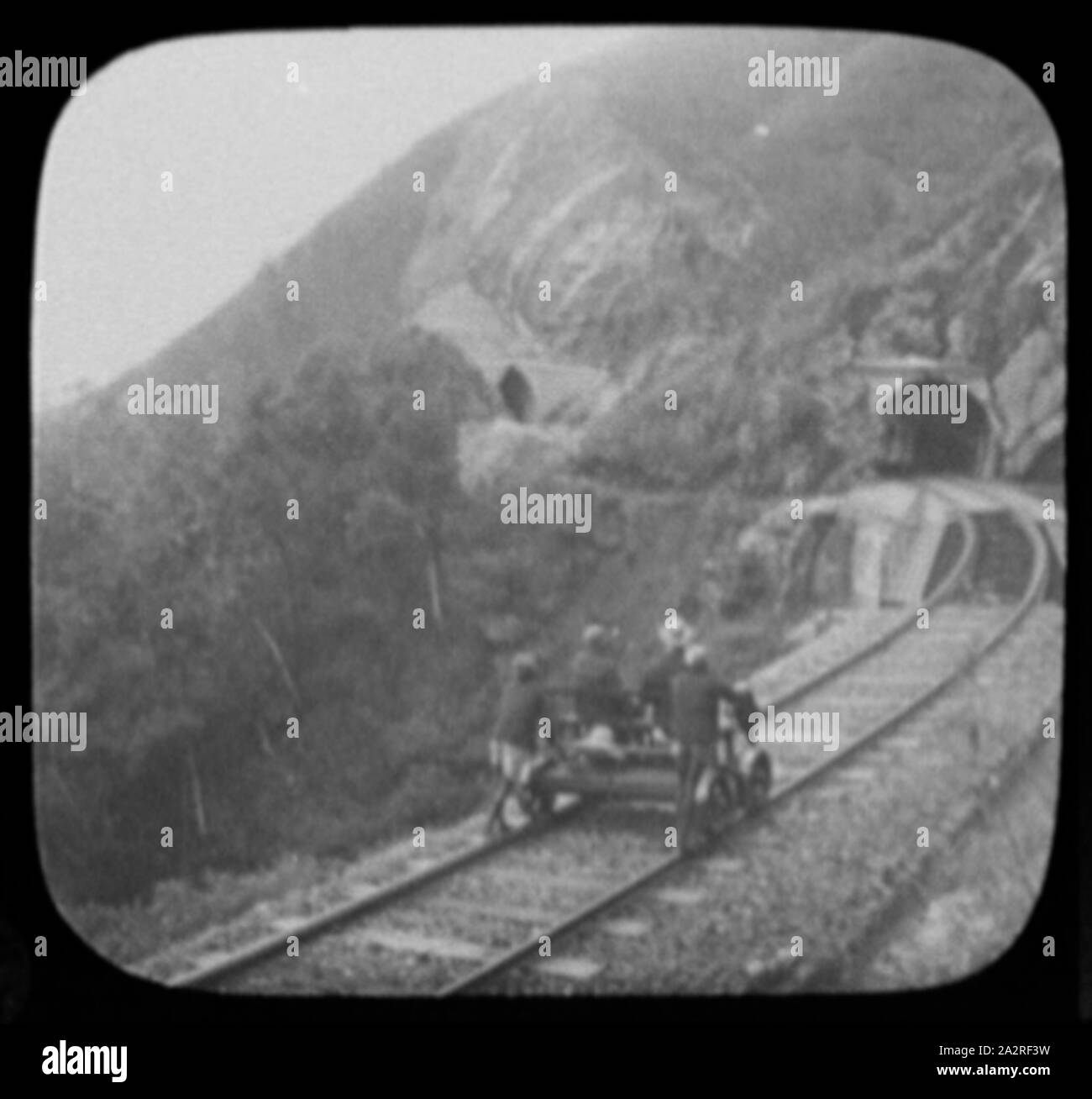 Railway section car approaching mountain tunnels Stock Photo - Alamy