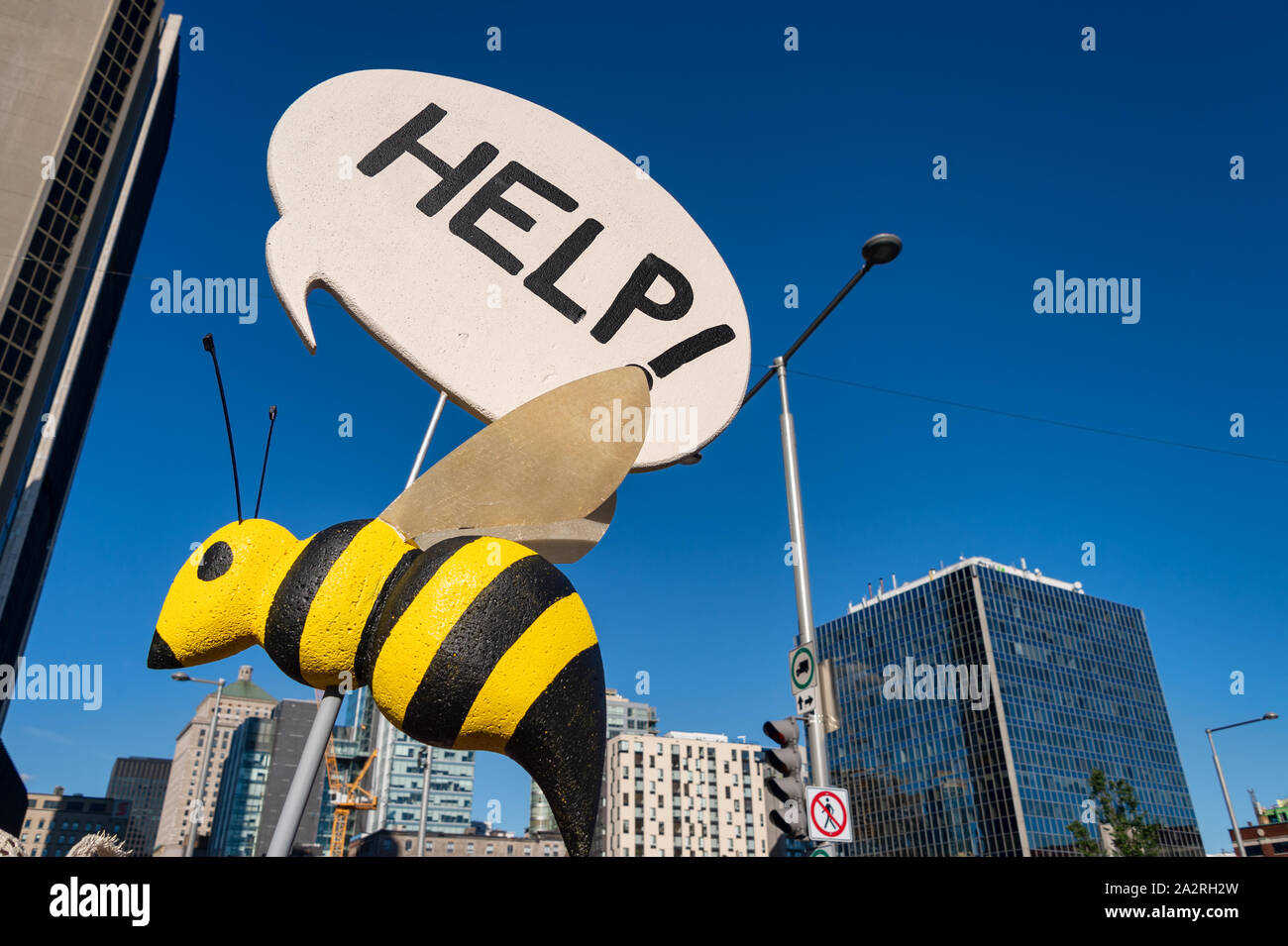 Fake bee with Help Sign during climate march in Montreal Stock Photo ...