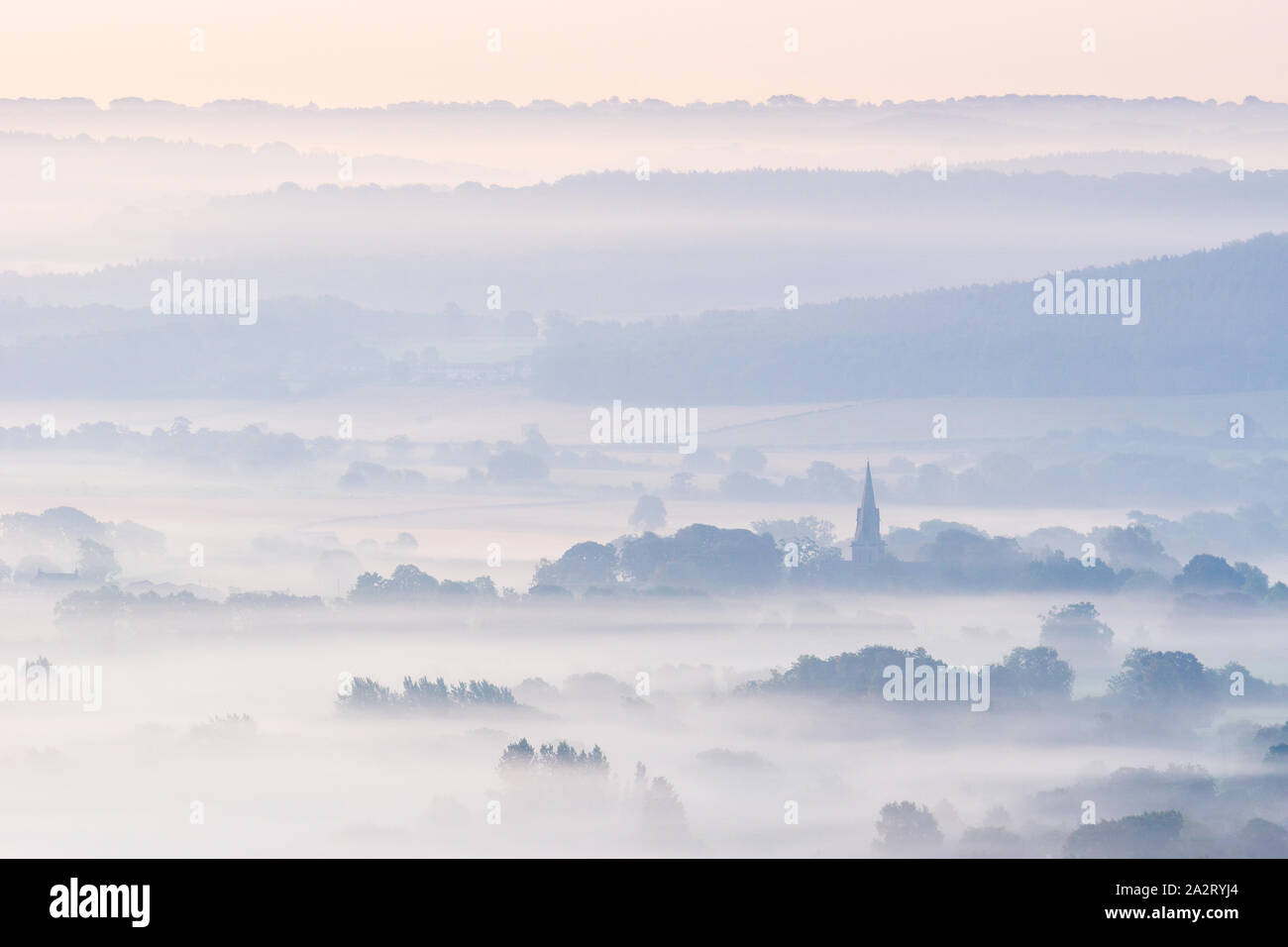 The spire of St Barnabas Church in Weeton, Yorkshire, is prominent ...