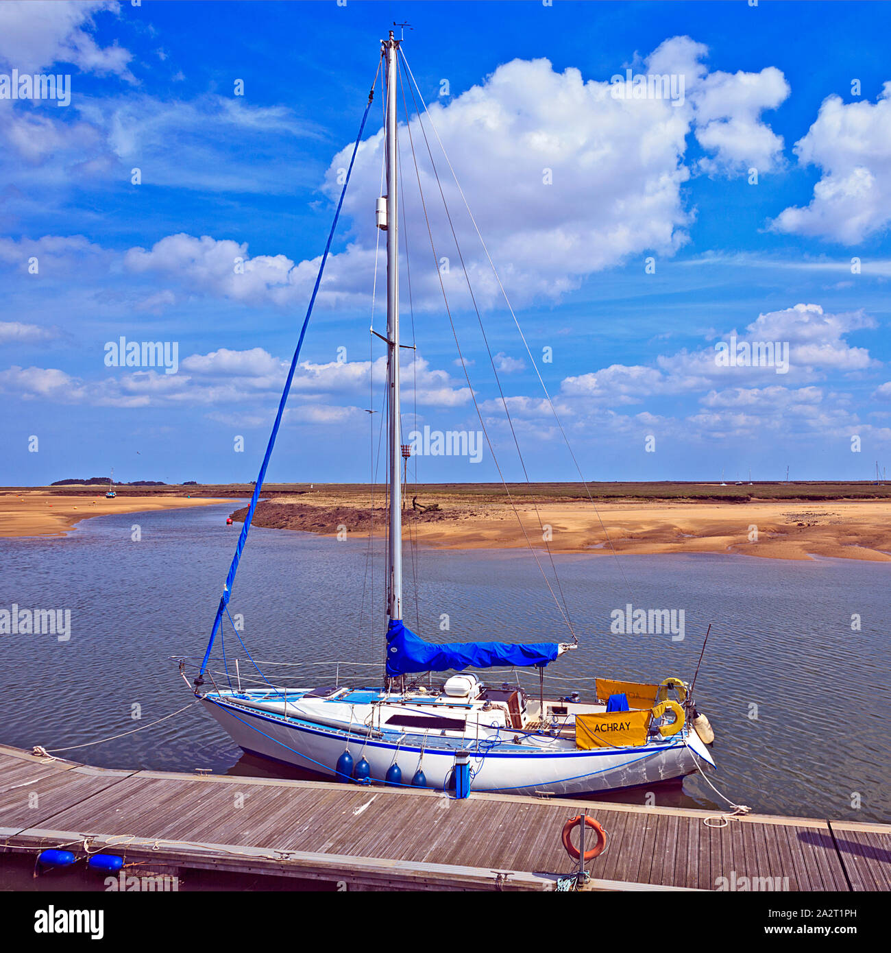Yacht moored on pontoon at Wells-next-the-Sea at Low Tide on the ...