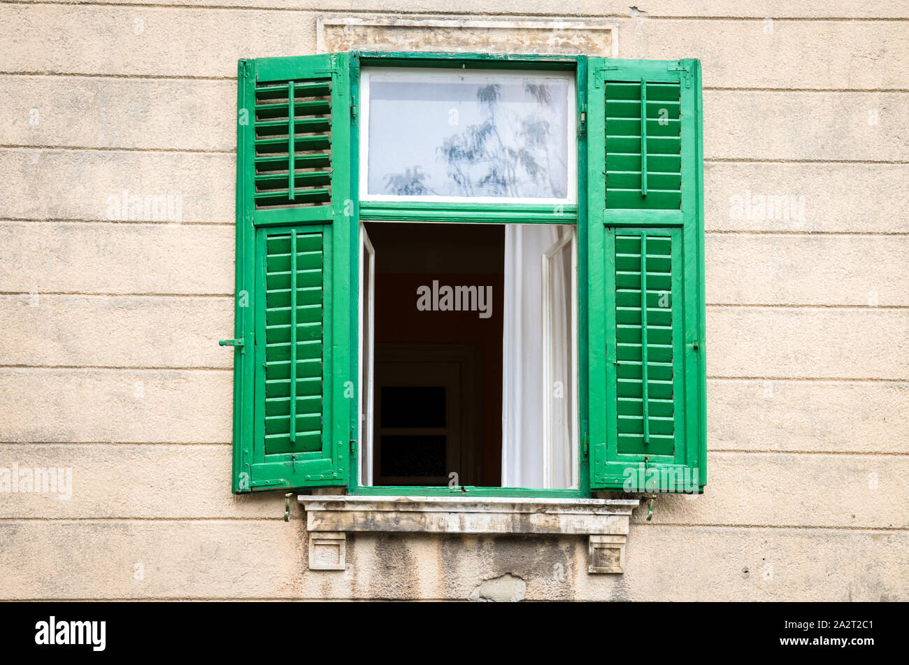 green open window in the building Stock Photo - Alamy