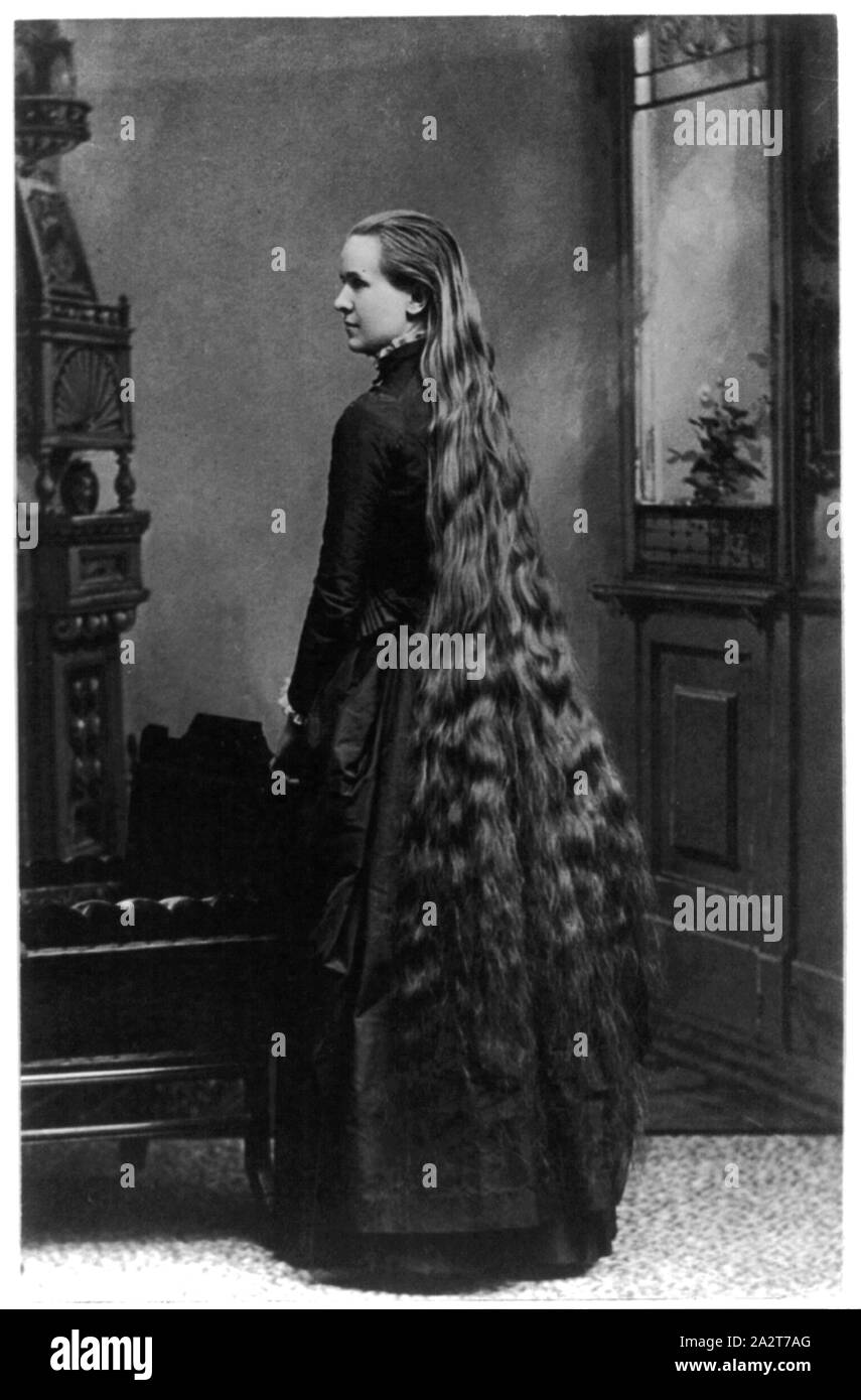 Rear view of woman, possibly Martha Matilda Harper, with hair reaching ...