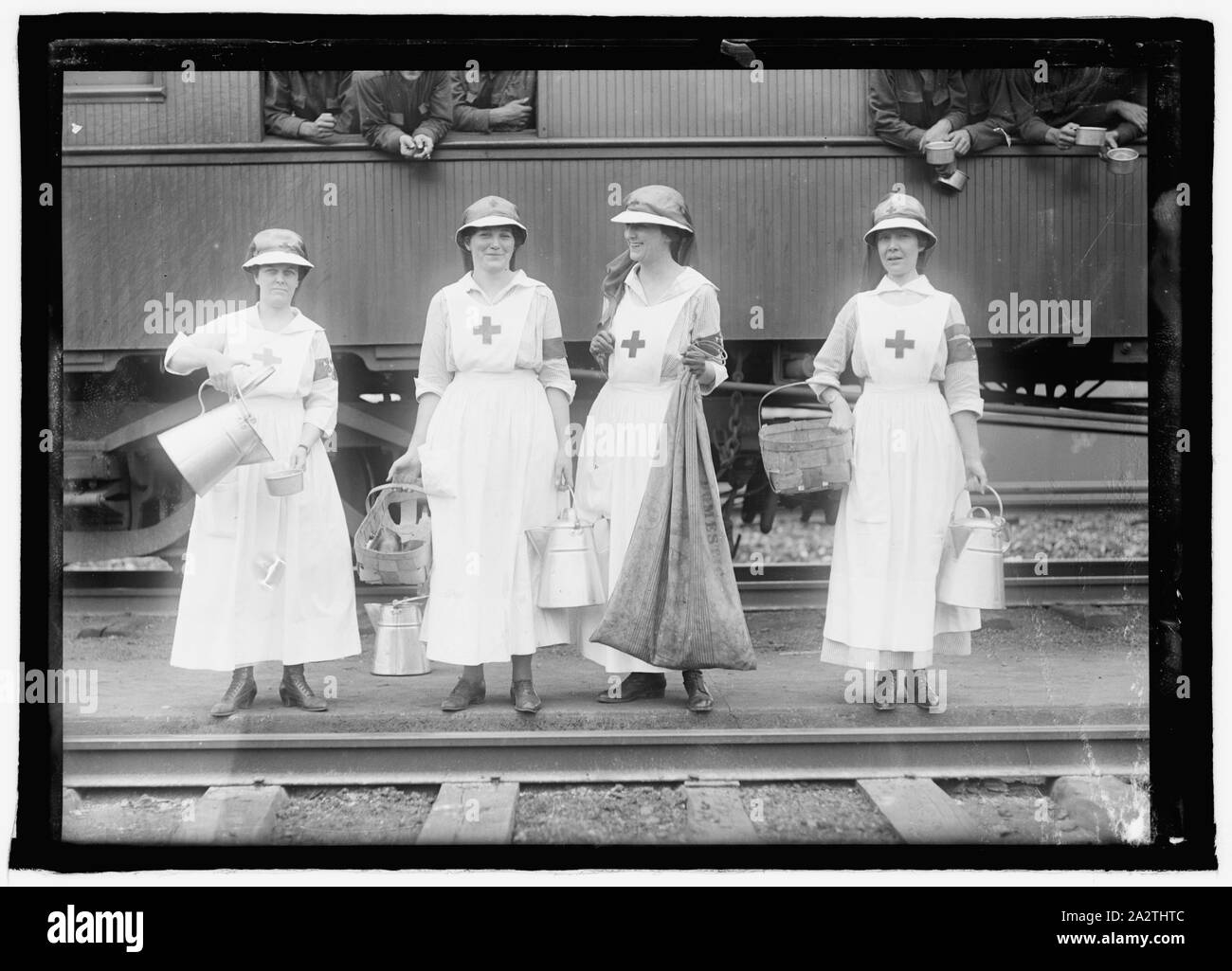 Red Cross workers near train Stock Photo - Alamy