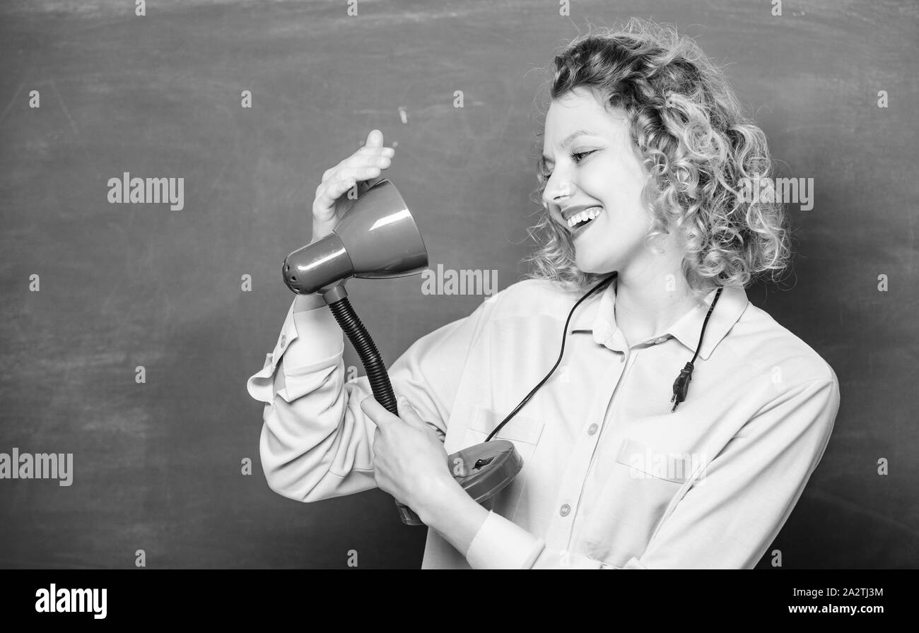 Turn light on. teacher with lamp at school blackboard. student girl ...