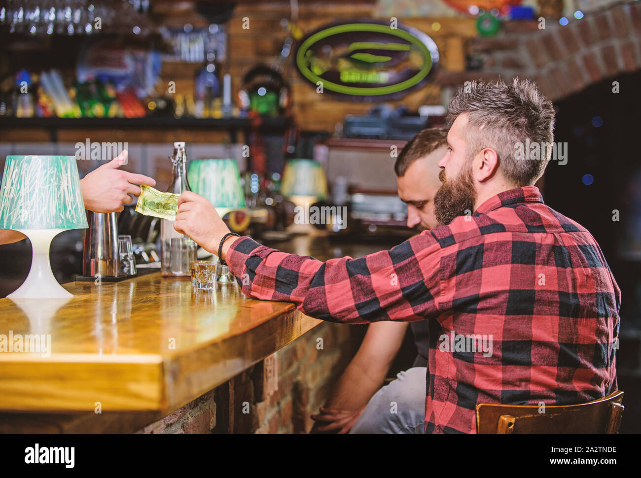 Men relaxing at bar. Friendship and leisure. Friday relaxation in bar ...