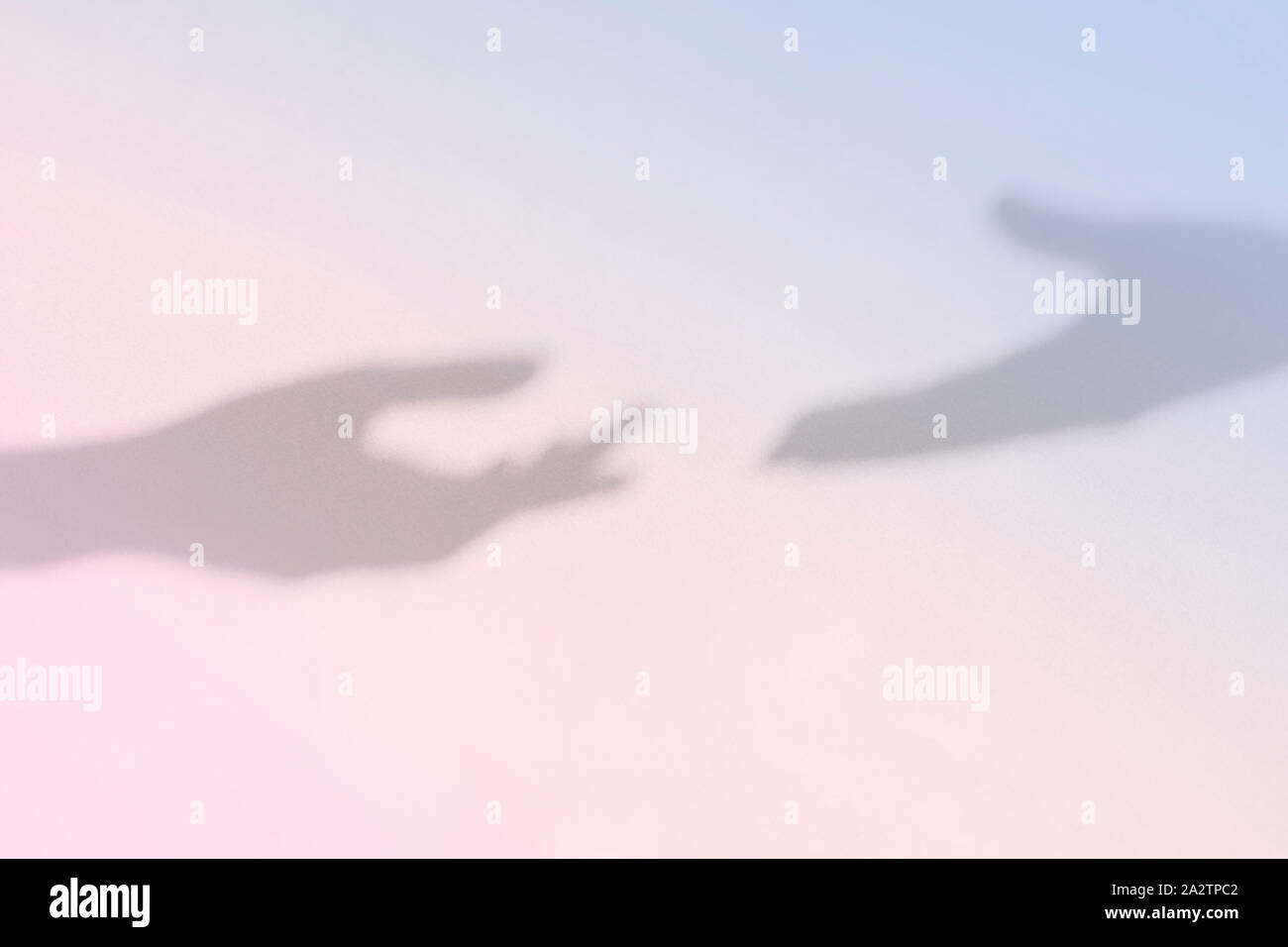 Two hands touching silhouette hi-res stock photography and images - Alamy