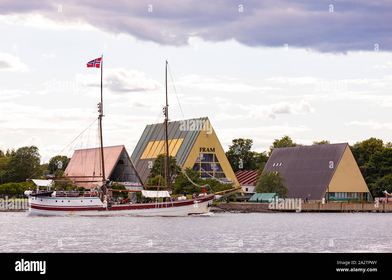 OSLO, NORWAY - Sailboat passes Norway Maritime Museum, Fram Museum ...