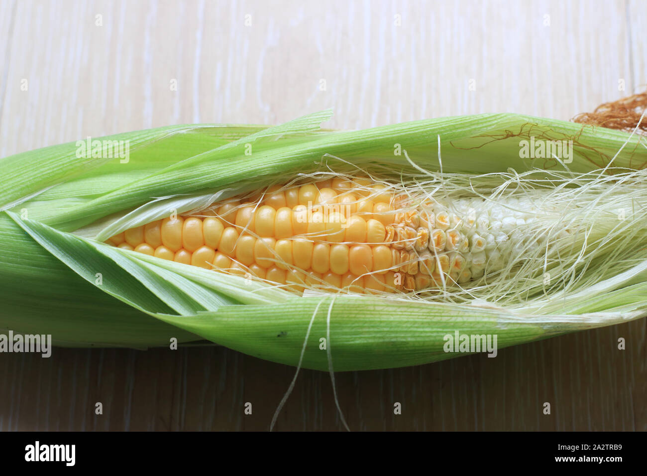 Corn with sleeves hi-res stock photography and images - Alamy