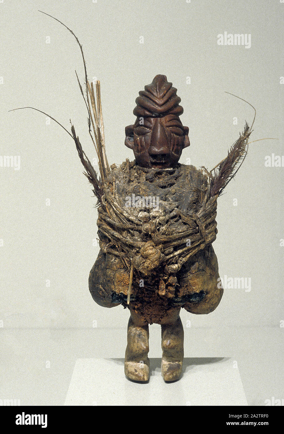 female figure, Yaka people, 20th century, wood, fiber, feathers, brass ...