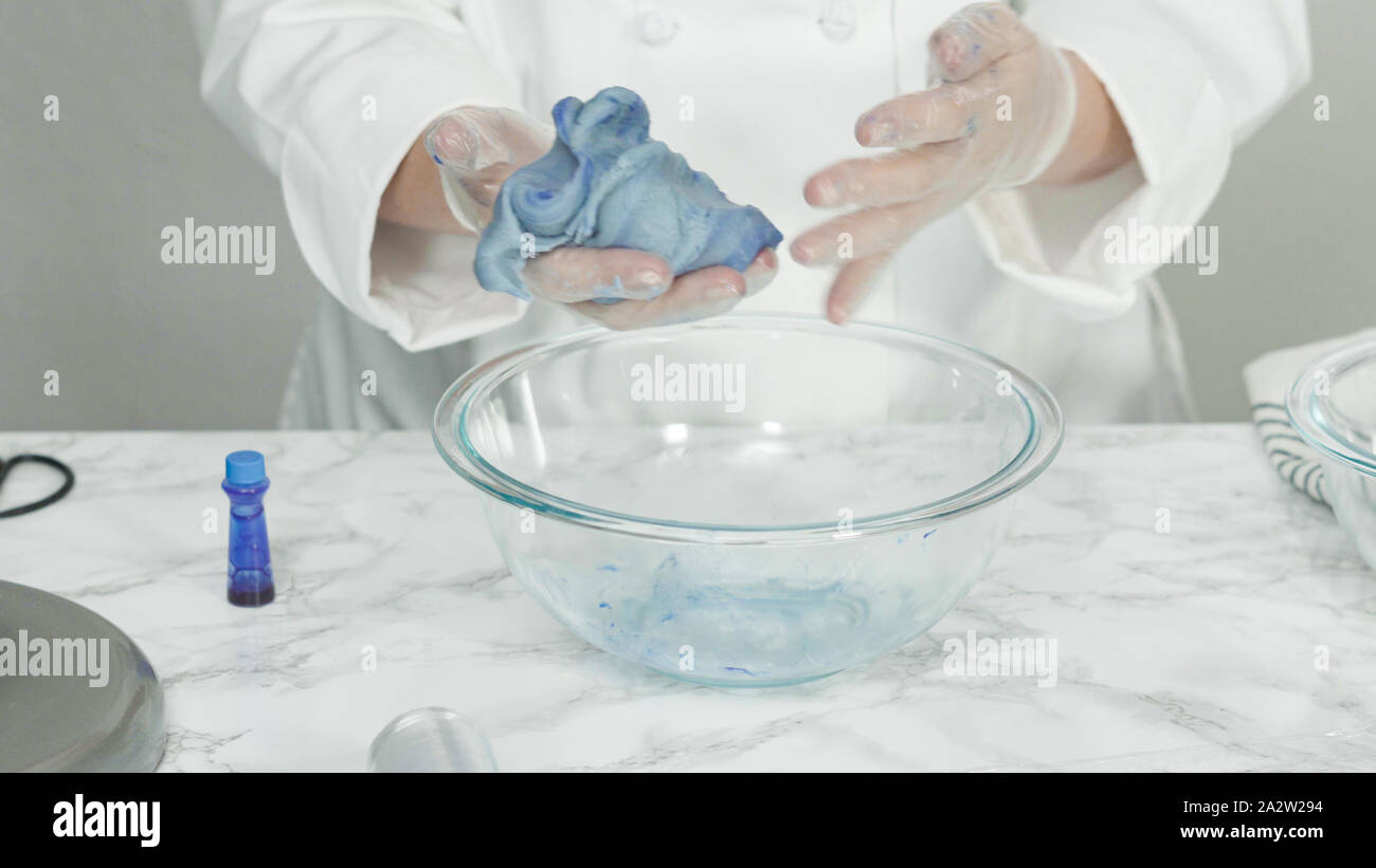 Step by step. Mixing food coloring into the cookie dough to bake red ...