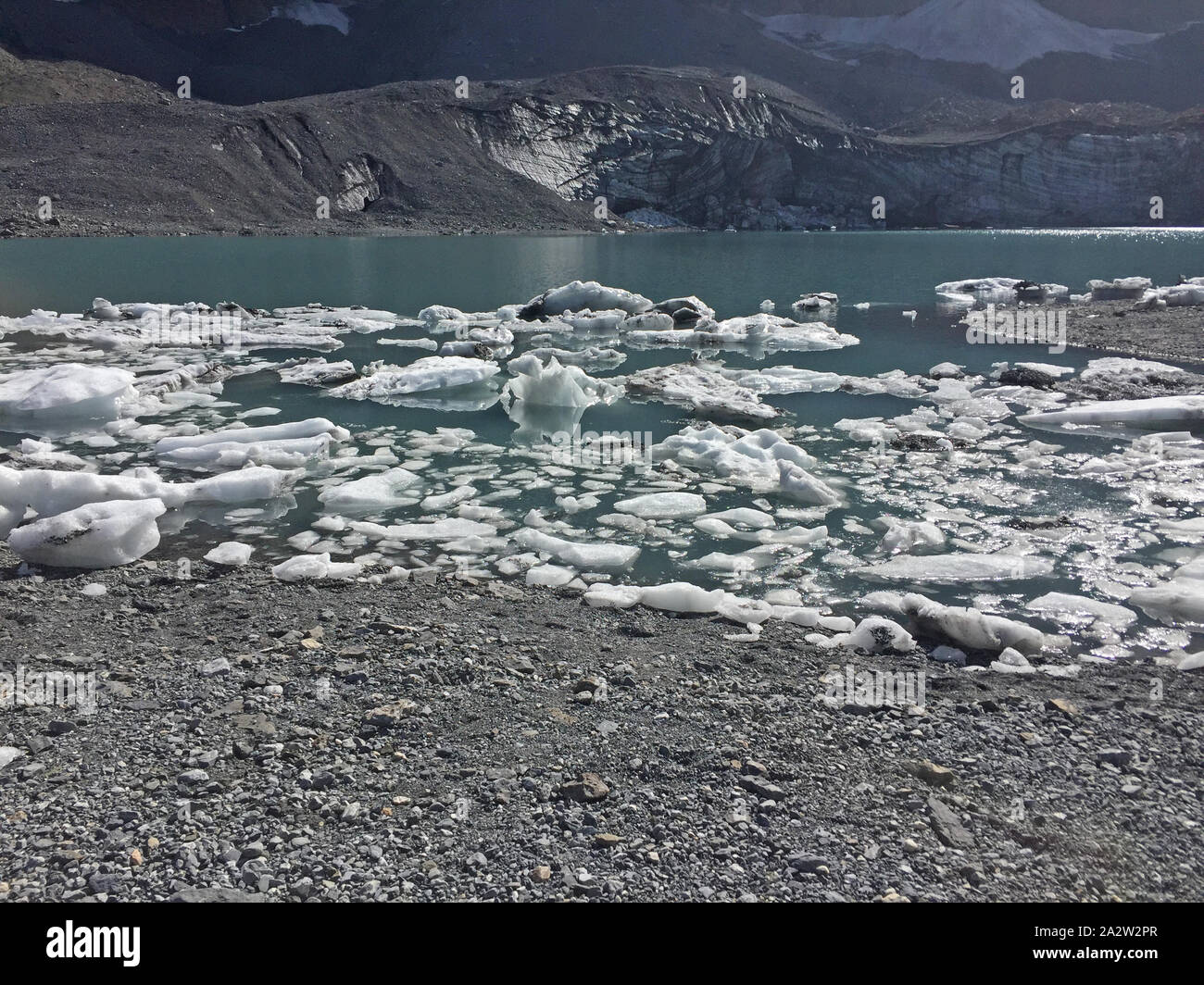 Floating ice sheets in the swiss alps Stock Photo - Alamy