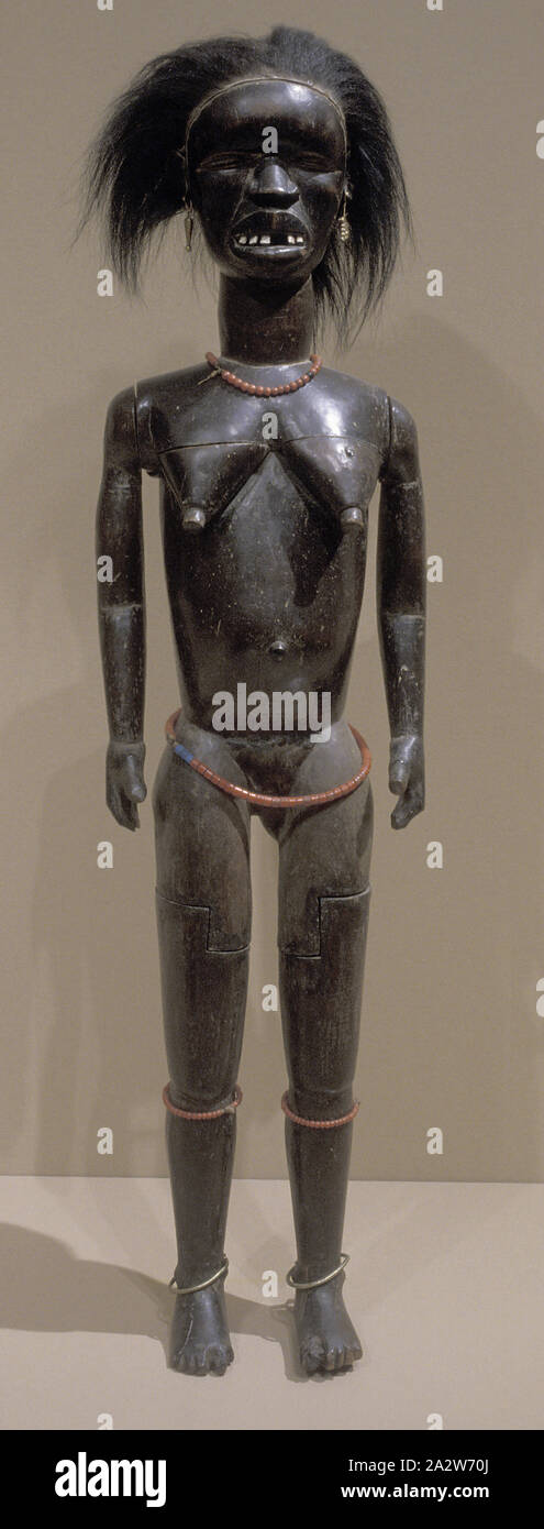 female figure, Dan people, 1920-1950, wood, pigment, fur, hide, metals ...