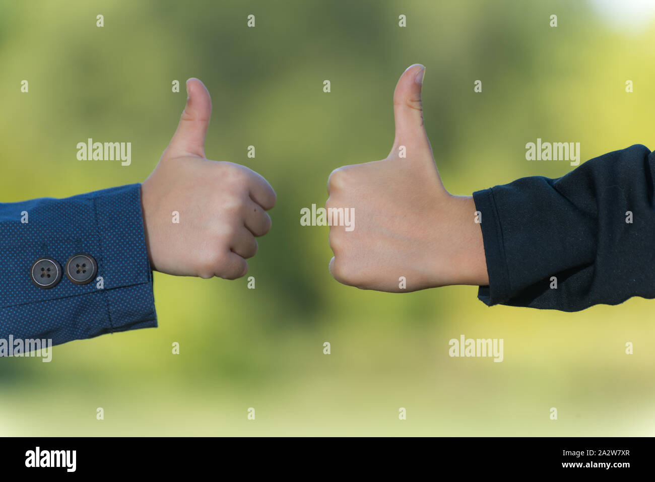 Gesture and body parts concept- human hands showing thumbs up Stock ...