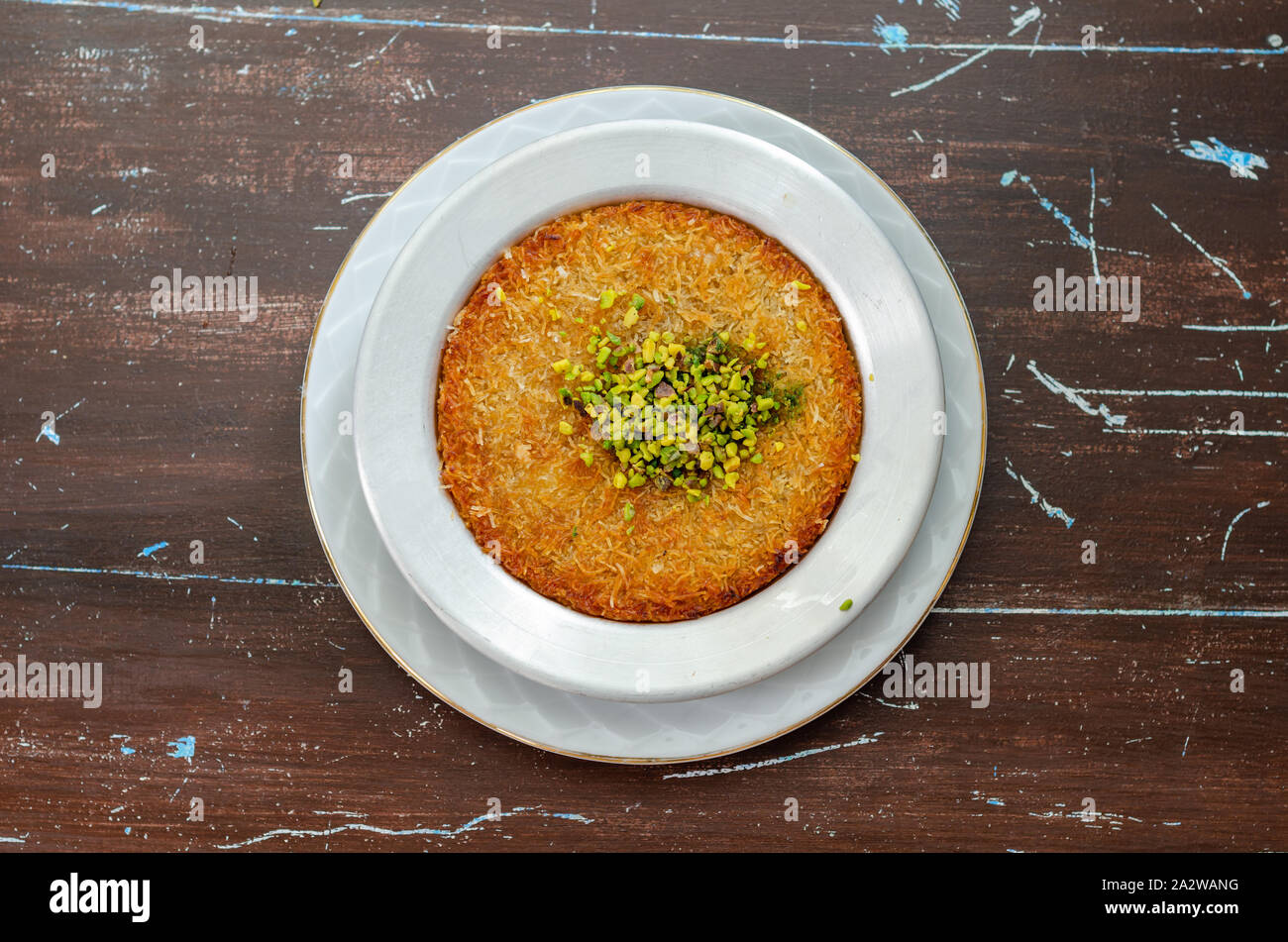 Delicious traditional Turkish dessert: Kunefe kadayif with pistachio ...