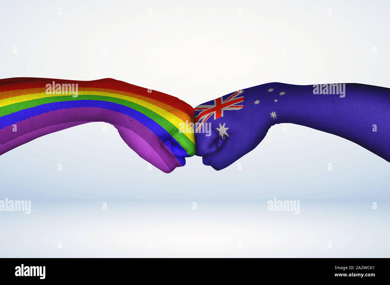 Fist bump of Australian and Pride Flags Two hands with painted flags of ...
