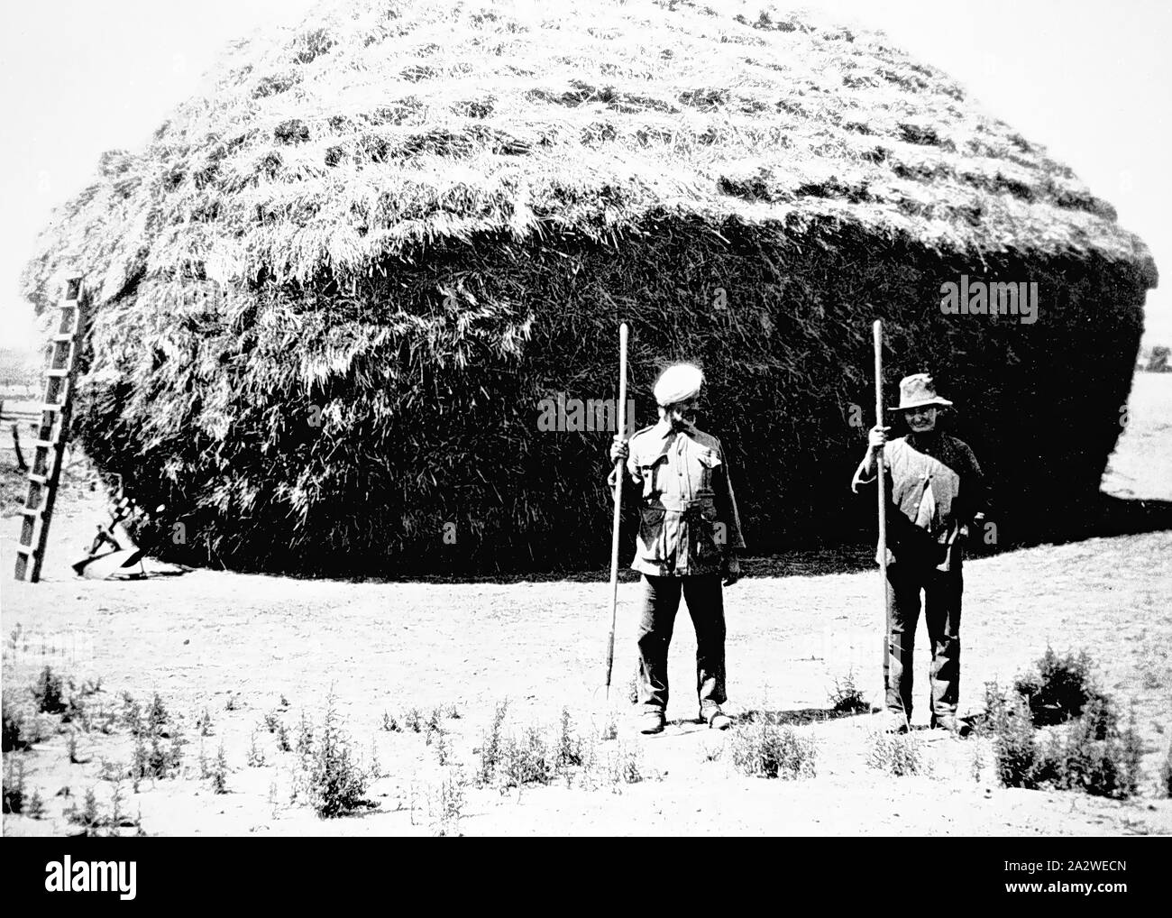 Negative - Two Men with Hay Stack, Nyah West, Victoria, 1932, Two men ...