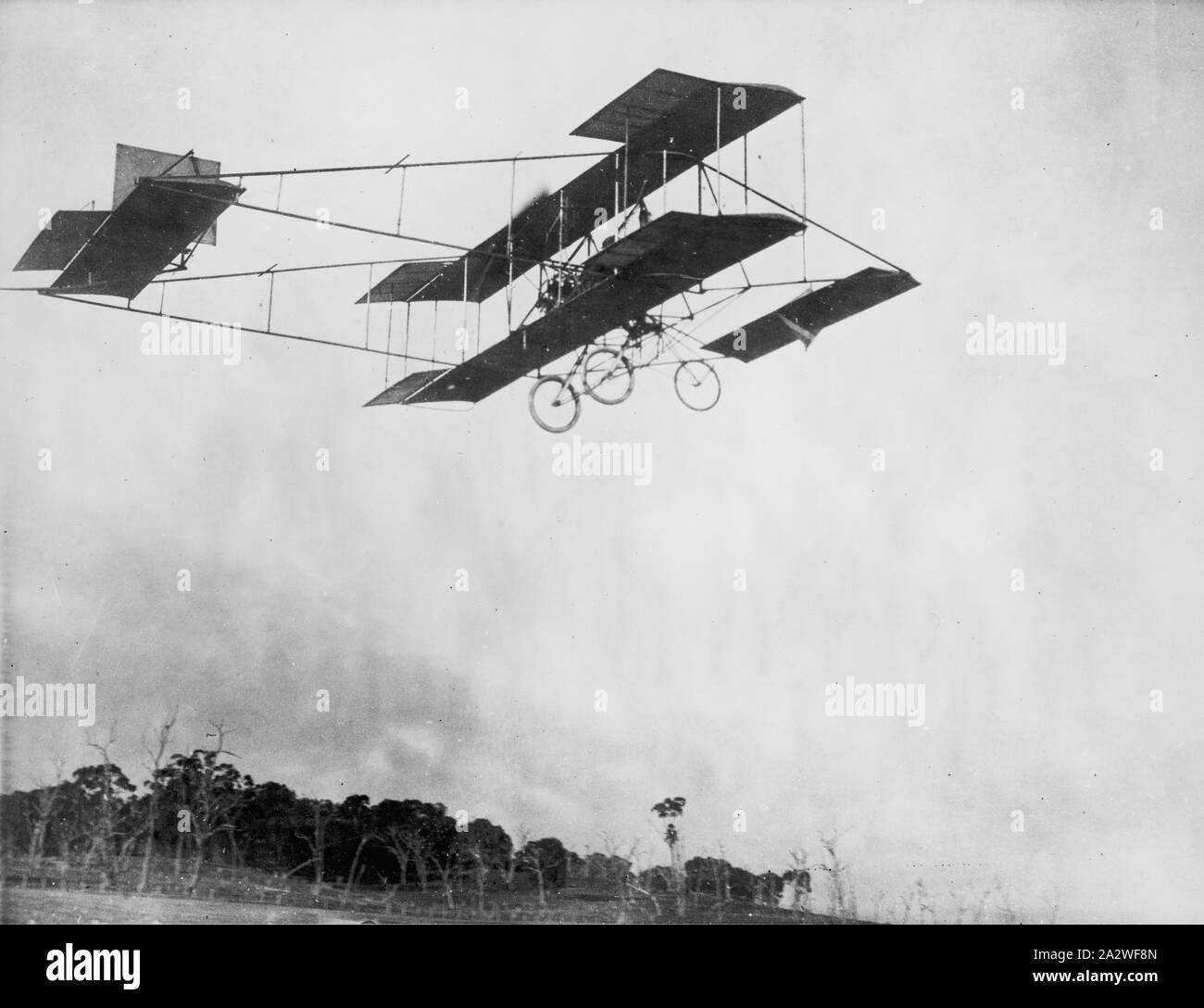 Modified duigan biplane flying hi-res stock photography and images - Alamy