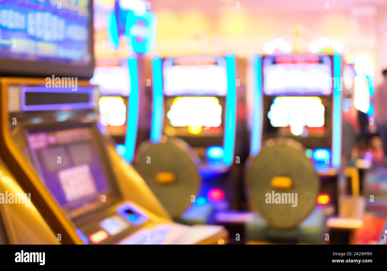 Casino slot machines background Stock Photo - Alamy