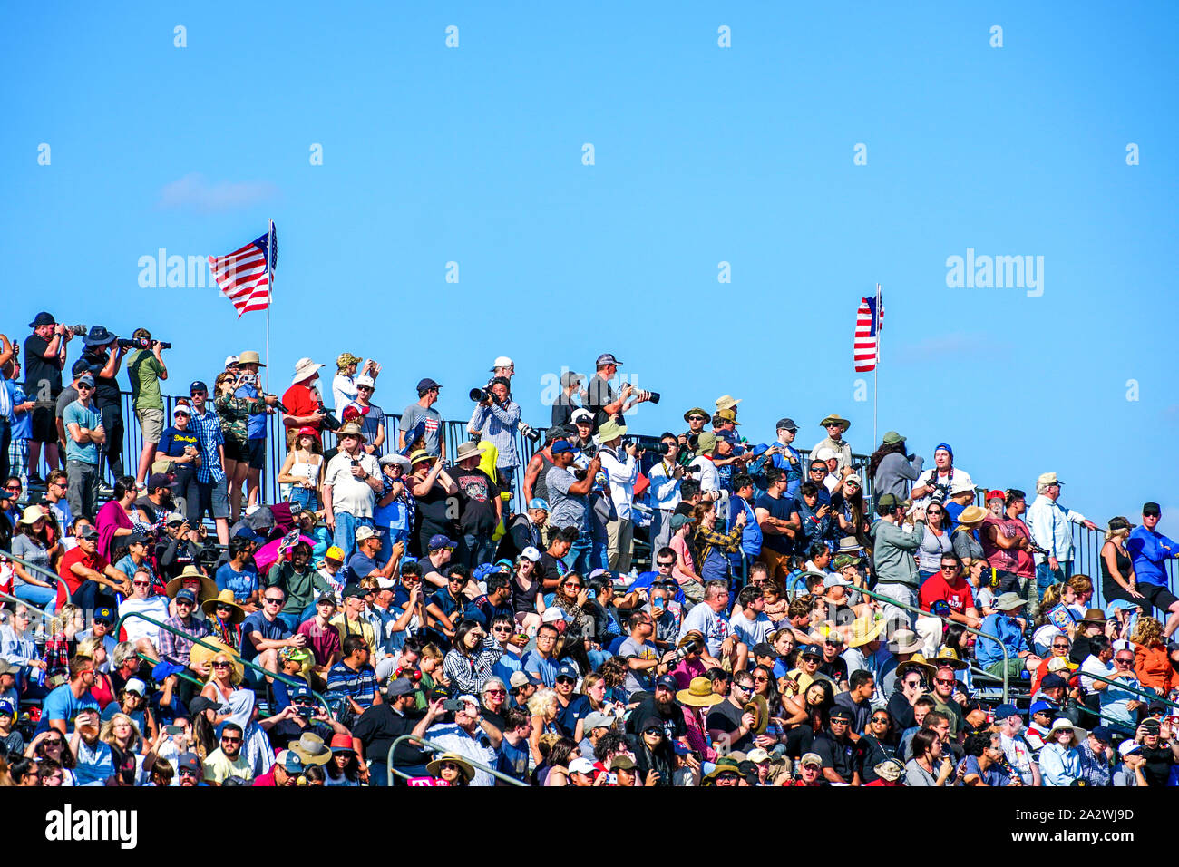 Sitting watching spectator crowded sport hi-res stock photography and ...