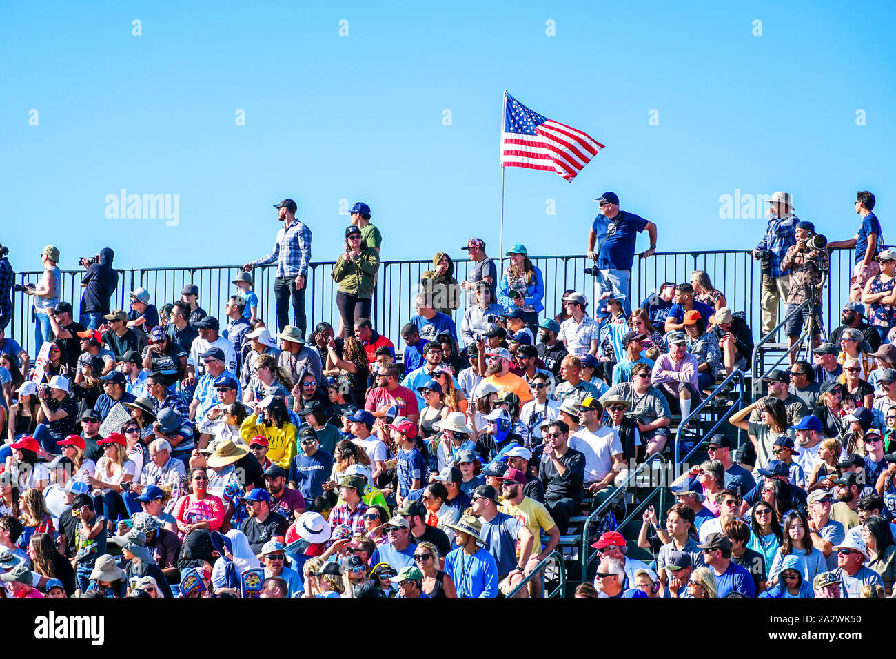 Sitting watching spectator crowded sport hi-res stock photography and ...
