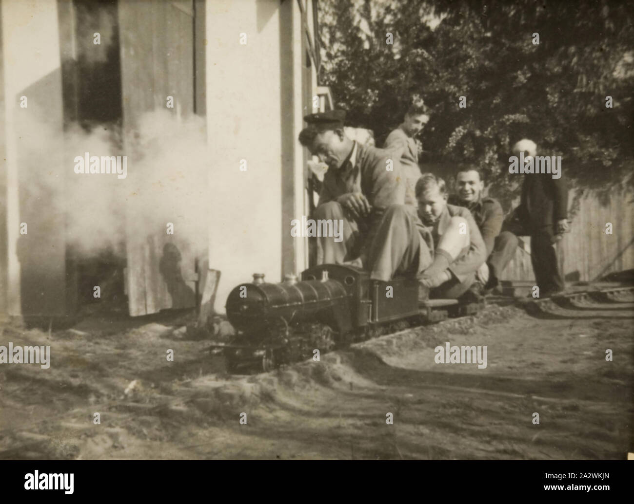 Digital Photograph - Man & Two Boys Riding Miniature Train for Charity ...