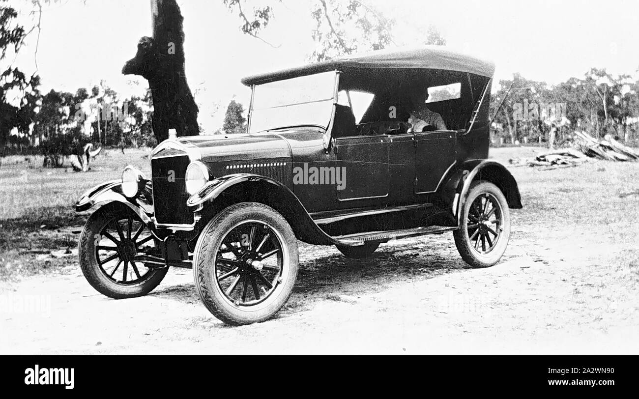 Negative - Model T Ford Motor Car with Woman Seated in the Back Seat ...
