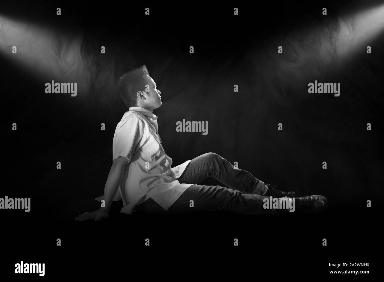 Man sitting down black and white hi-res stock photography and images ...