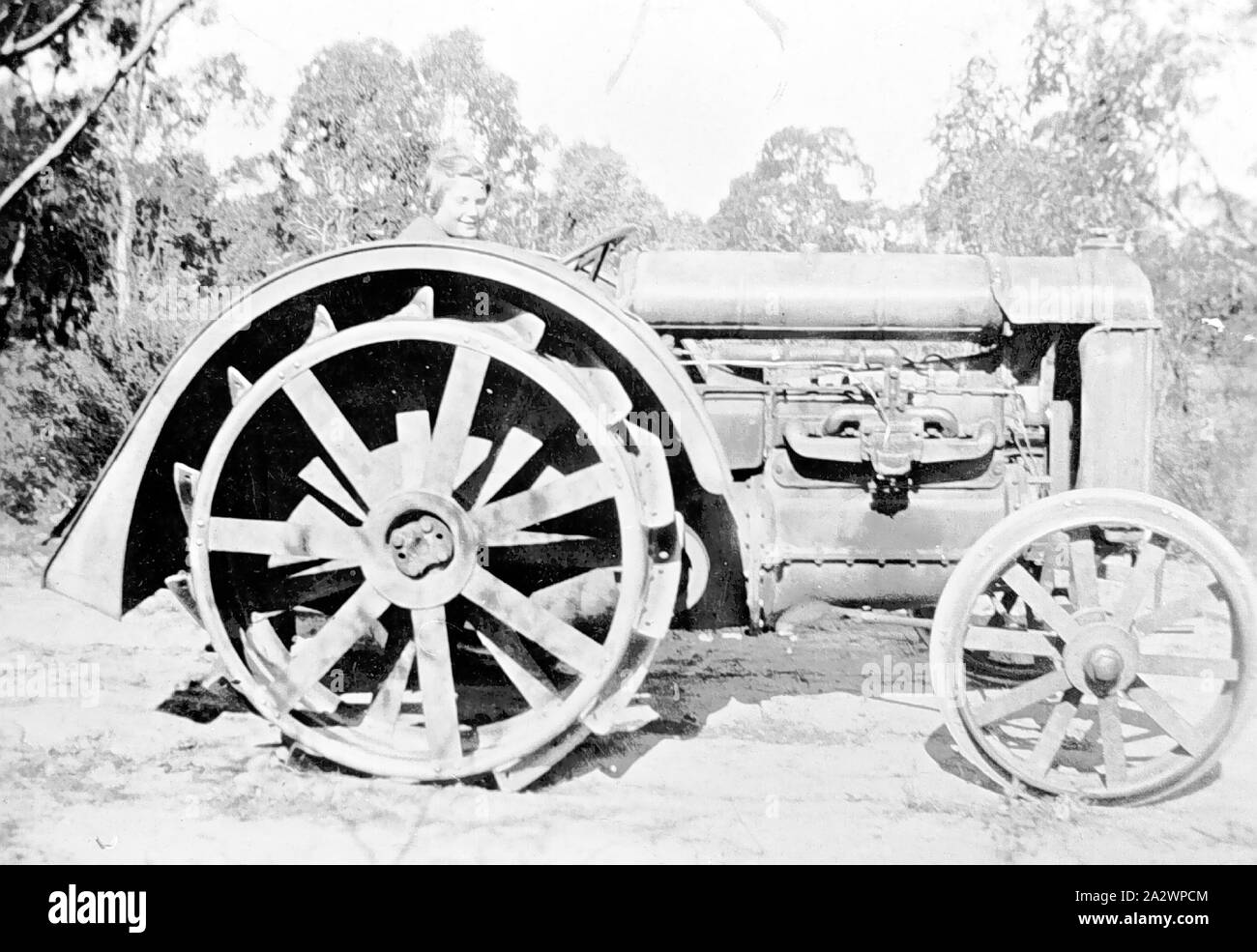 Negative - Fordson Tractor, Scotsburn, Victoria, 1930, A child seated ...