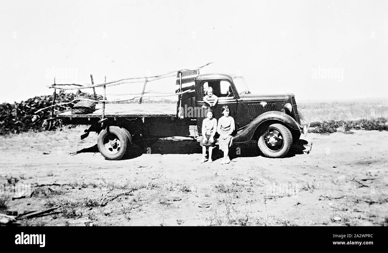 Negative - Mittyack, Victoria, circa 1935, A truck with one child in ...