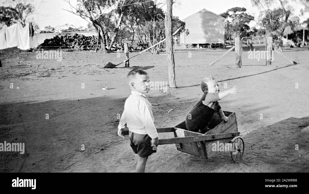 Negative - Manangatang, Victoria, circa 1935, One small boy pushing ...