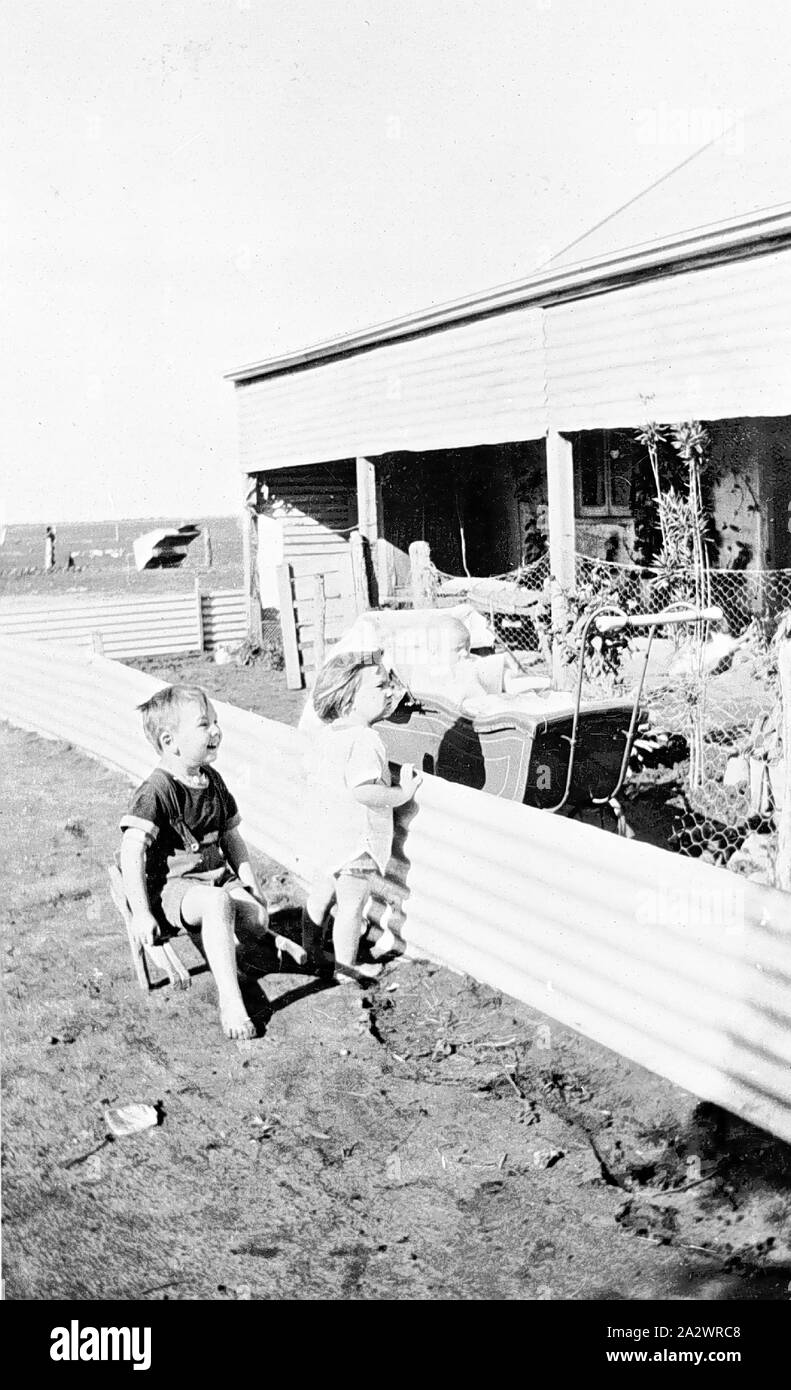 Negative - Manangatang, Victoria, 1932, Two small children by a mouse ...