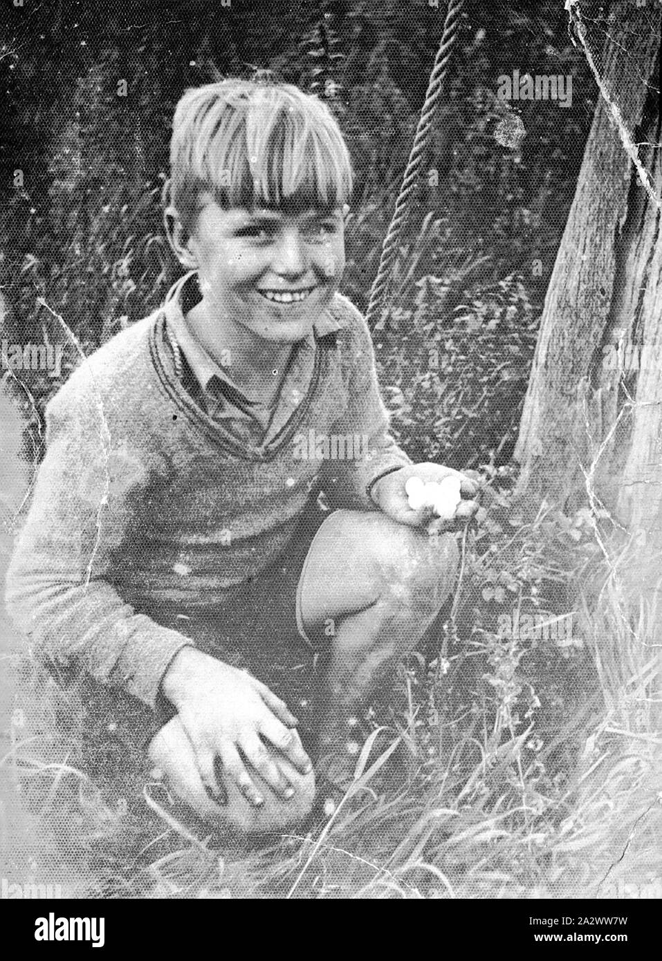 Negative - Shepparton District, Victoria, circa 1935, A boy with bird's ...