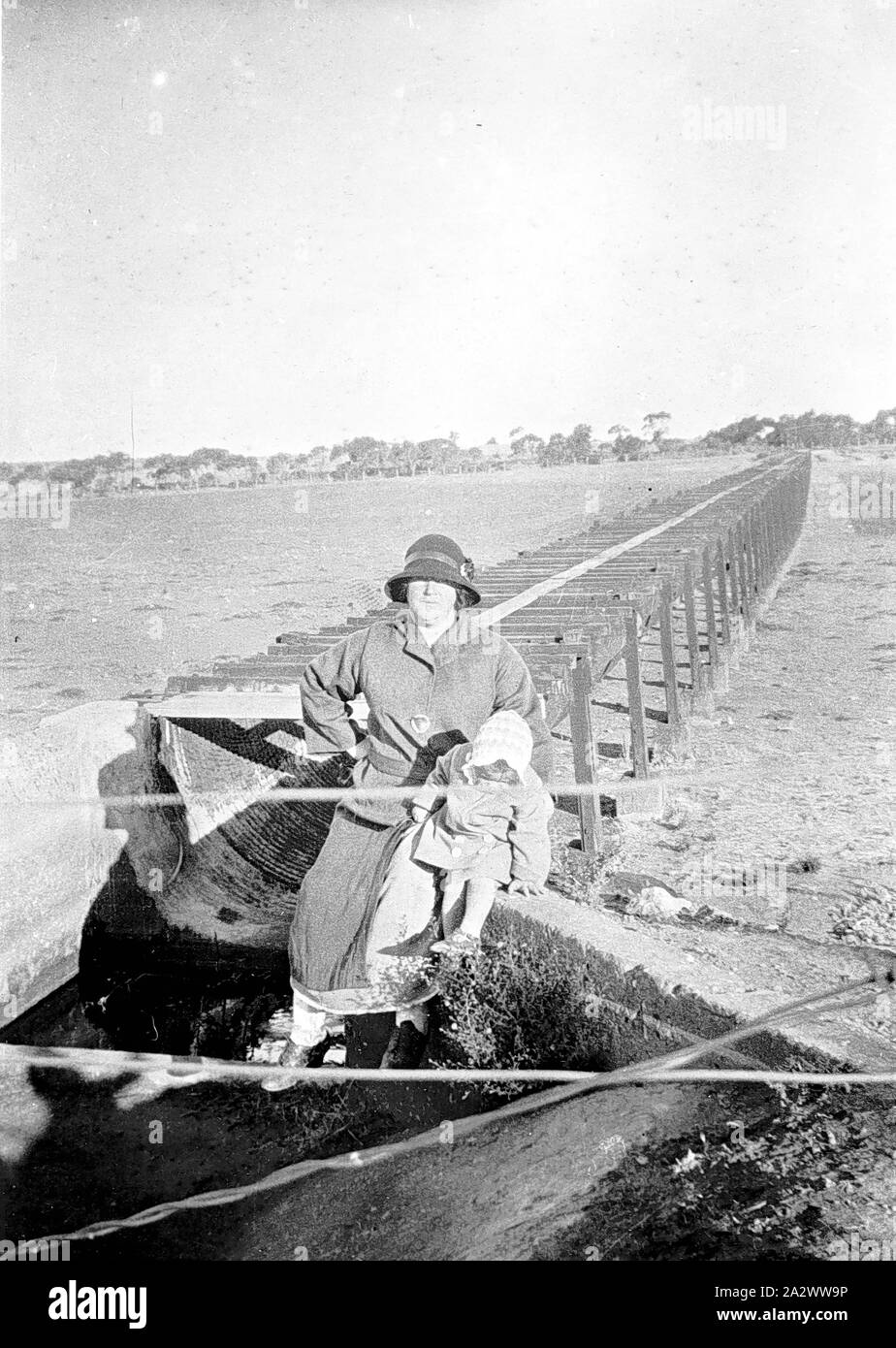 Negative - Nyah West, Victoria, 1924, A woman and child sitting in a ...