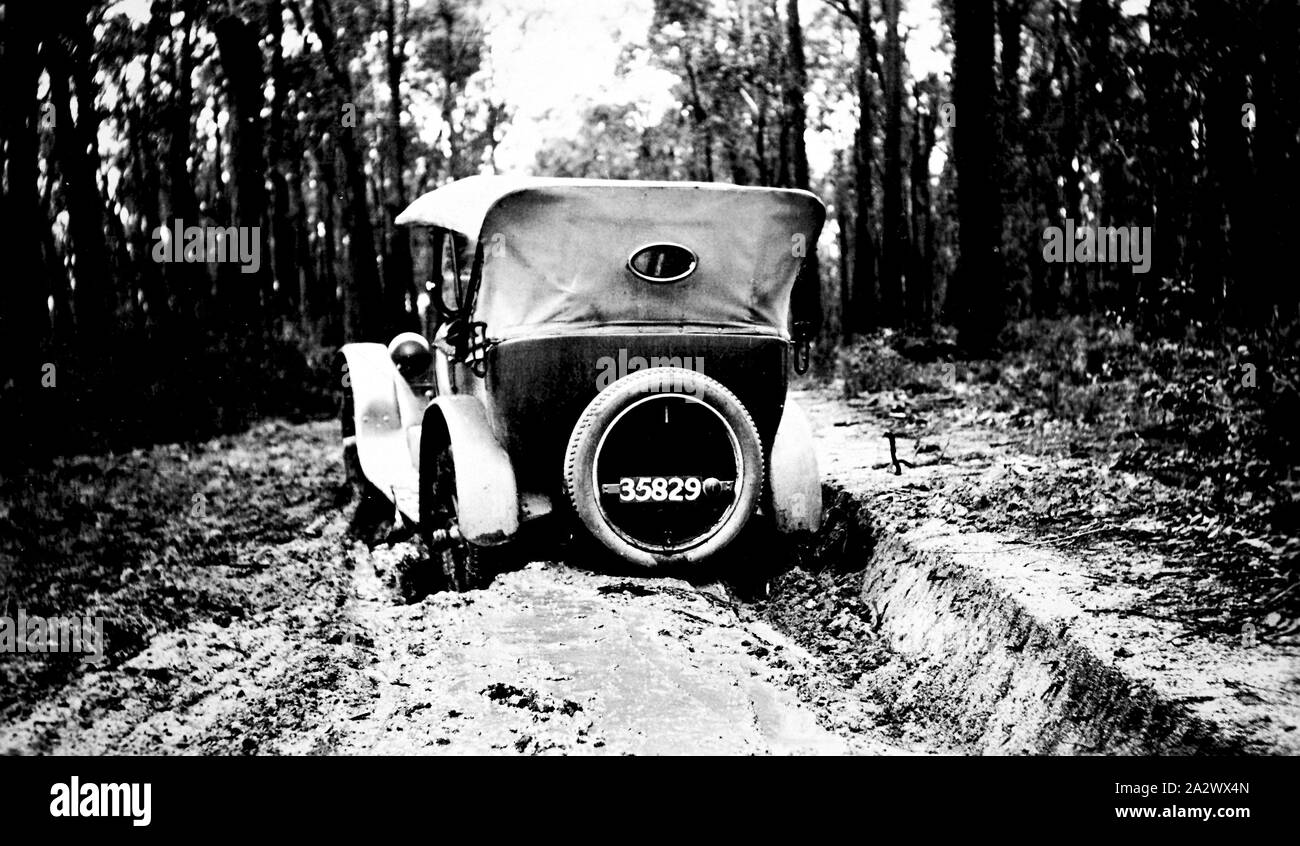 Negative - Gippsland, Victoria, 1928, A bogged car on a bush track ...