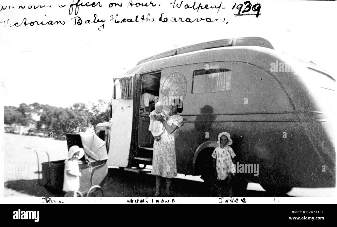 Two small children stand beside hi-res stock photography and images - Alamy