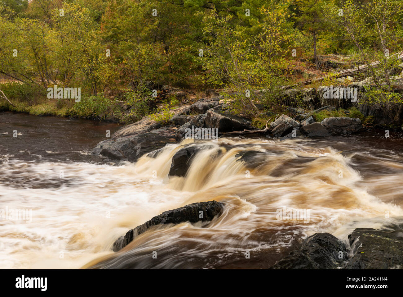 Eau Claire River Waterfall In Autumn Stock Photo - Alamy