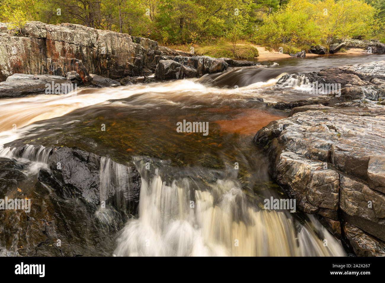 Eau Claire River Waterfall In Autumn Stock Photo - Alamy