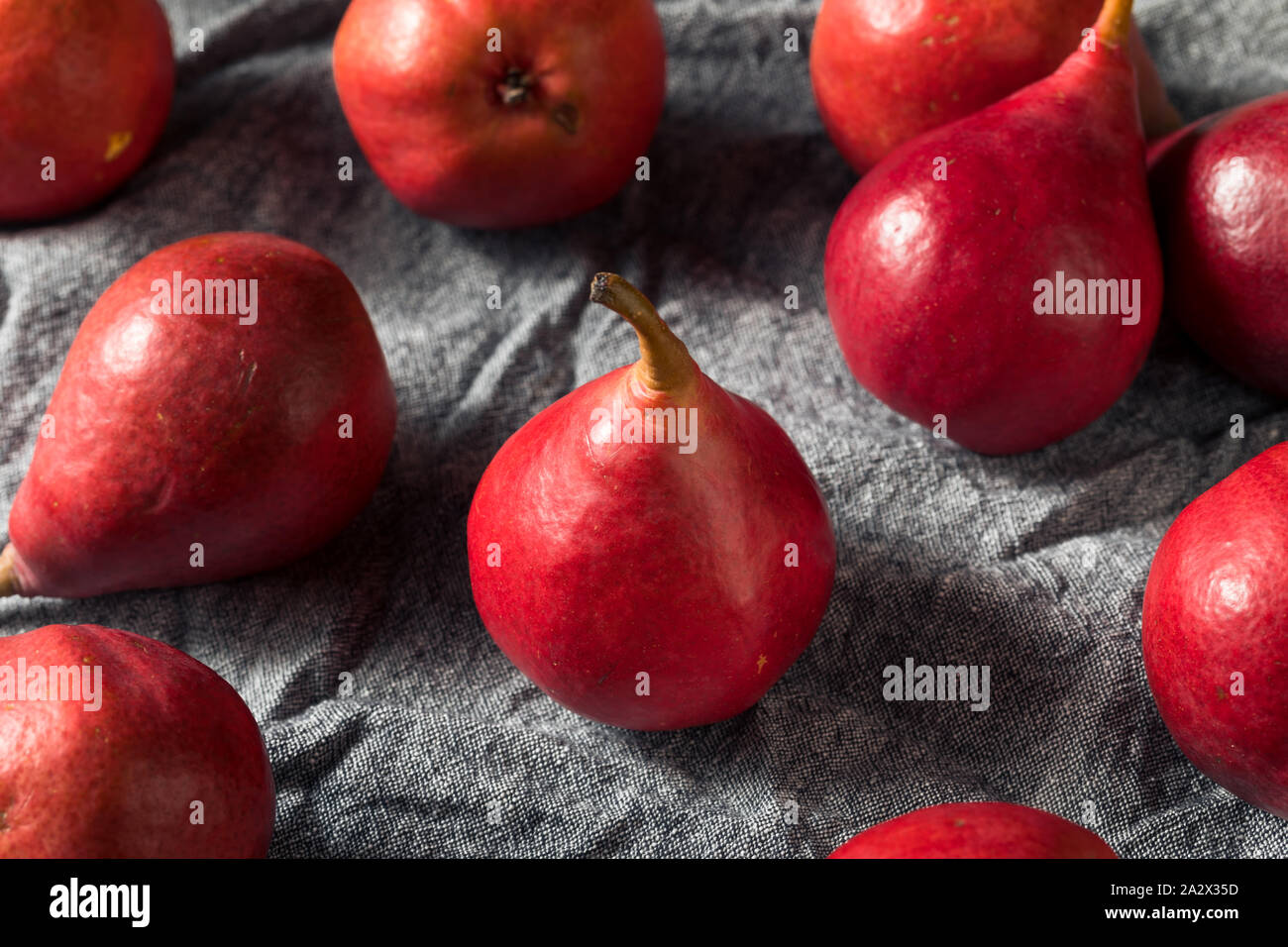 Raw Red Organic Anjou Pears in a Bunch Stock Photo - Alamy