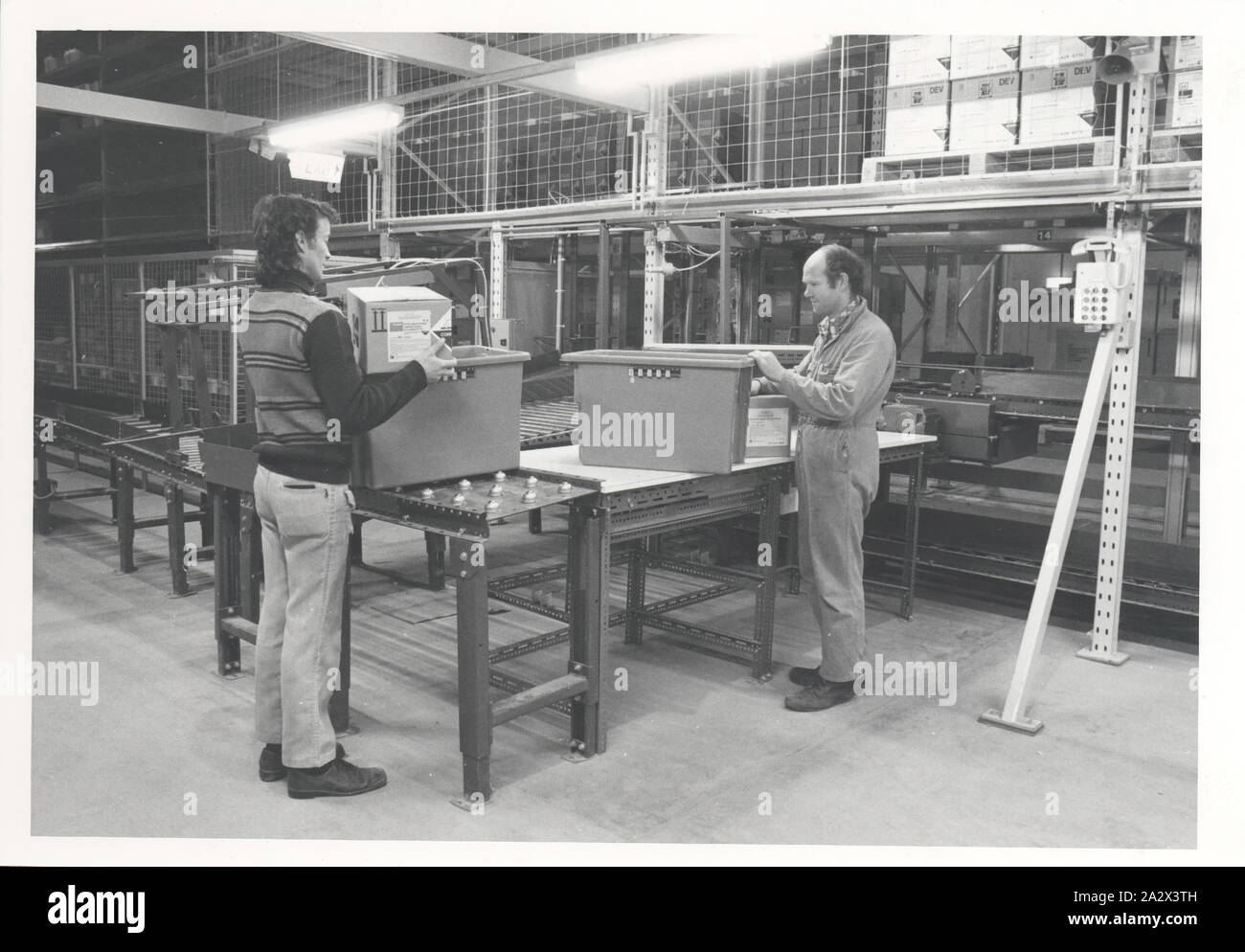 Photograph, Employees Packing in Warehouse, circa 1970s, Black & white ...