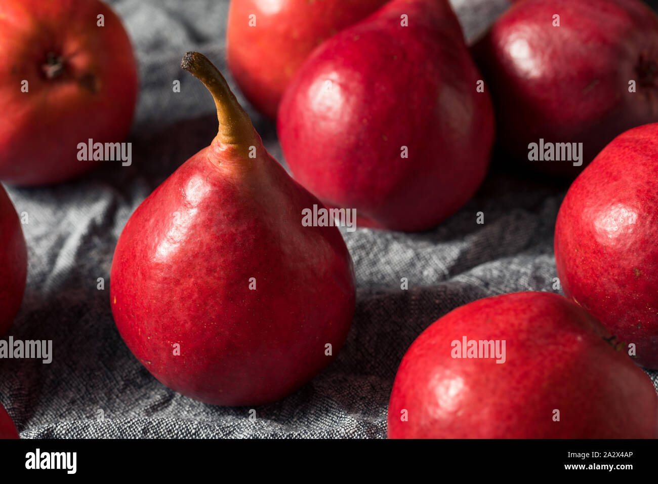 Raw Red Organic Anjou Pears in a Bunch Stock Photo - Alamy