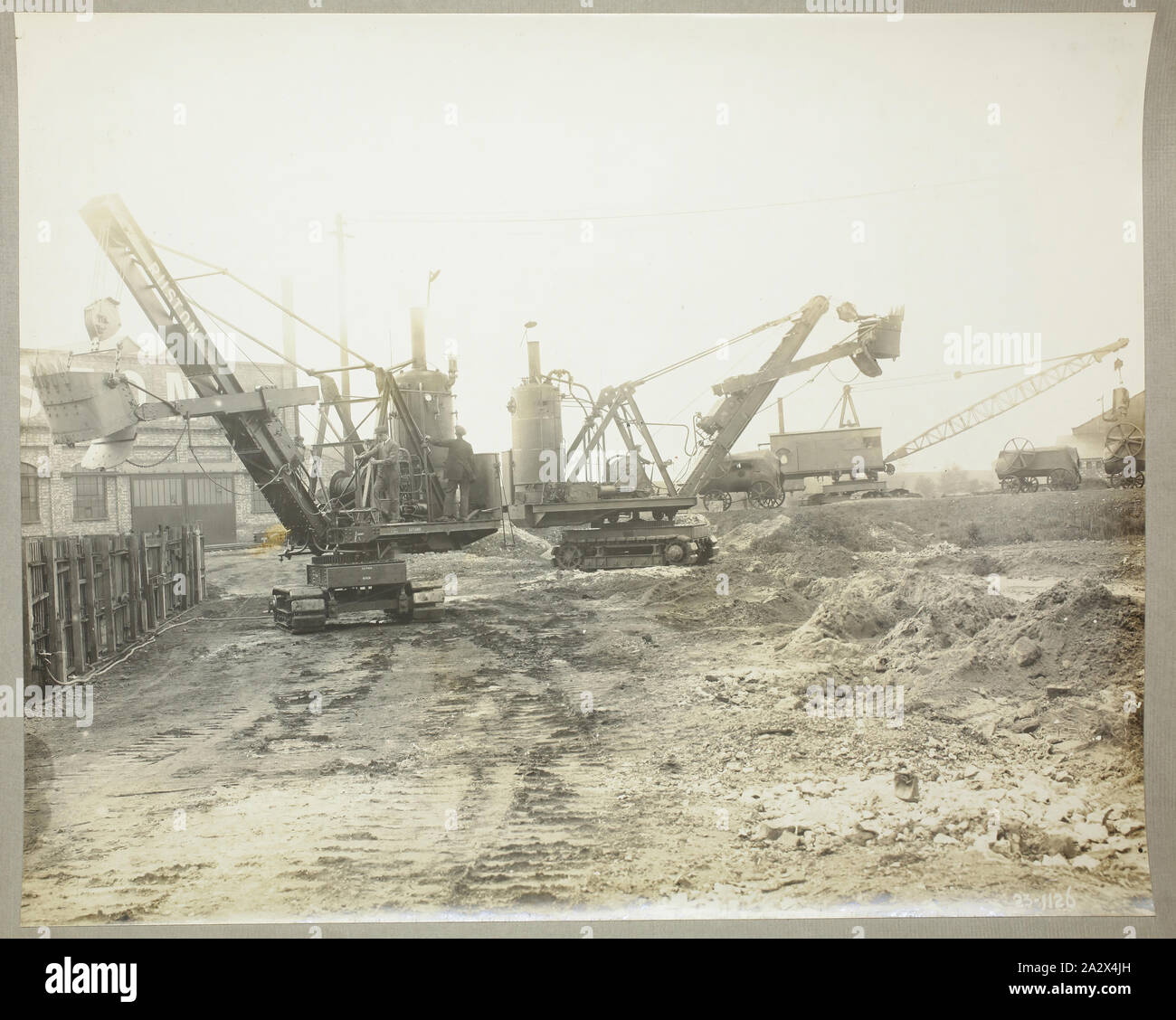 Photograph - Ruston & Hornsby, Crawler-Mounted Steam Shovels in a Yard ...