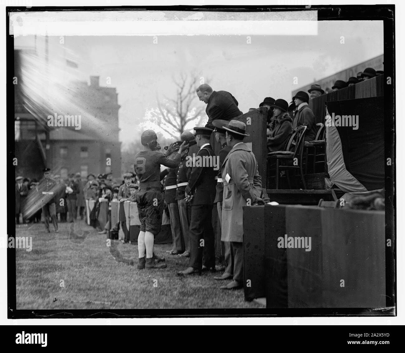 Rev. Jason Noble Pierce hands out ball for Pres. Coolidge, Scout Fleet ...