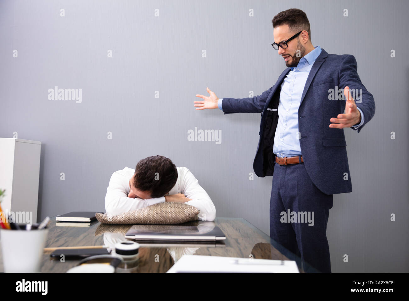 Angry Boss Caught Tired Lazy Employee Sleeping At Workplace Stock Photo ...