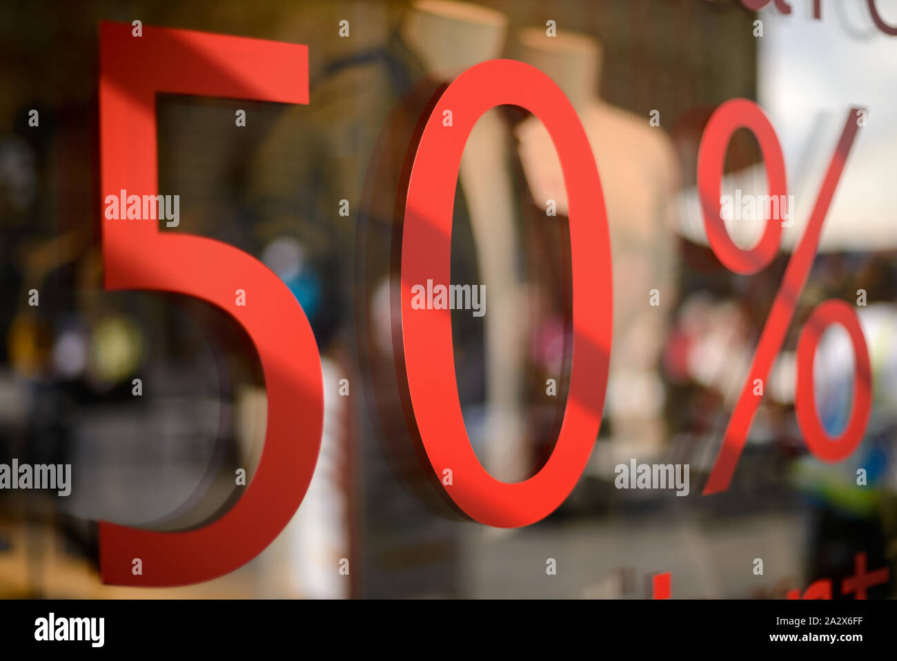 Big fifty percent rebates discount percentages on store window display ...