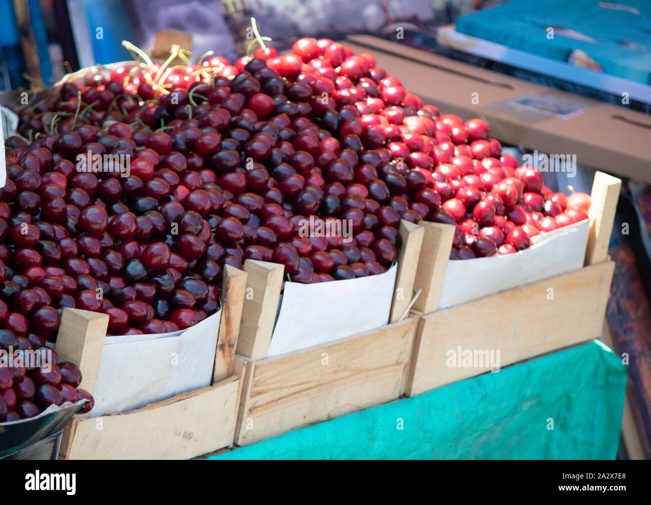 Close up of a cherry crate at the greengrocer counter Stock Photo - Alamy