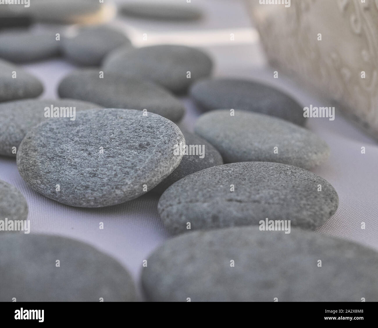 stone pebbles at wedding ceremony reception Stock Photo - Alamy