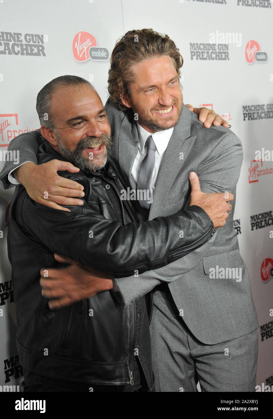 LOS ANGELES, CA. September 21, 2011: Gerard Butler (right) & Sam ...